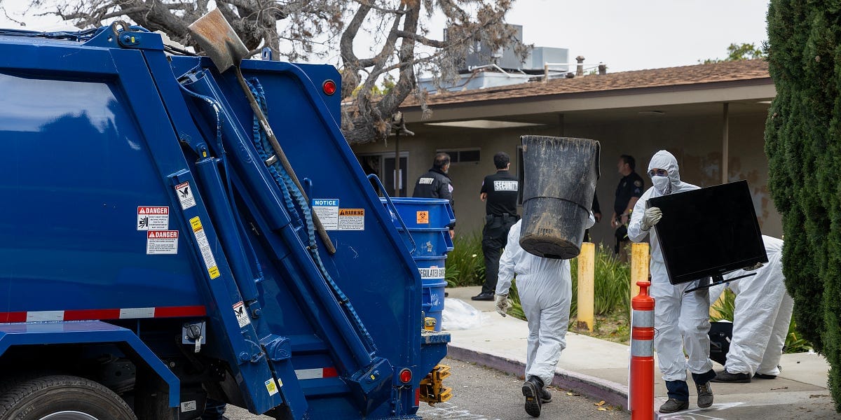 Crews clear homeless encampment in vacant building to make way for ...
